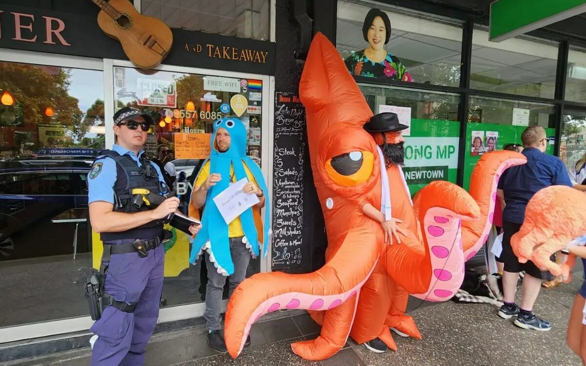 Jewish protesters in Octopus costumes at Greens MP's office