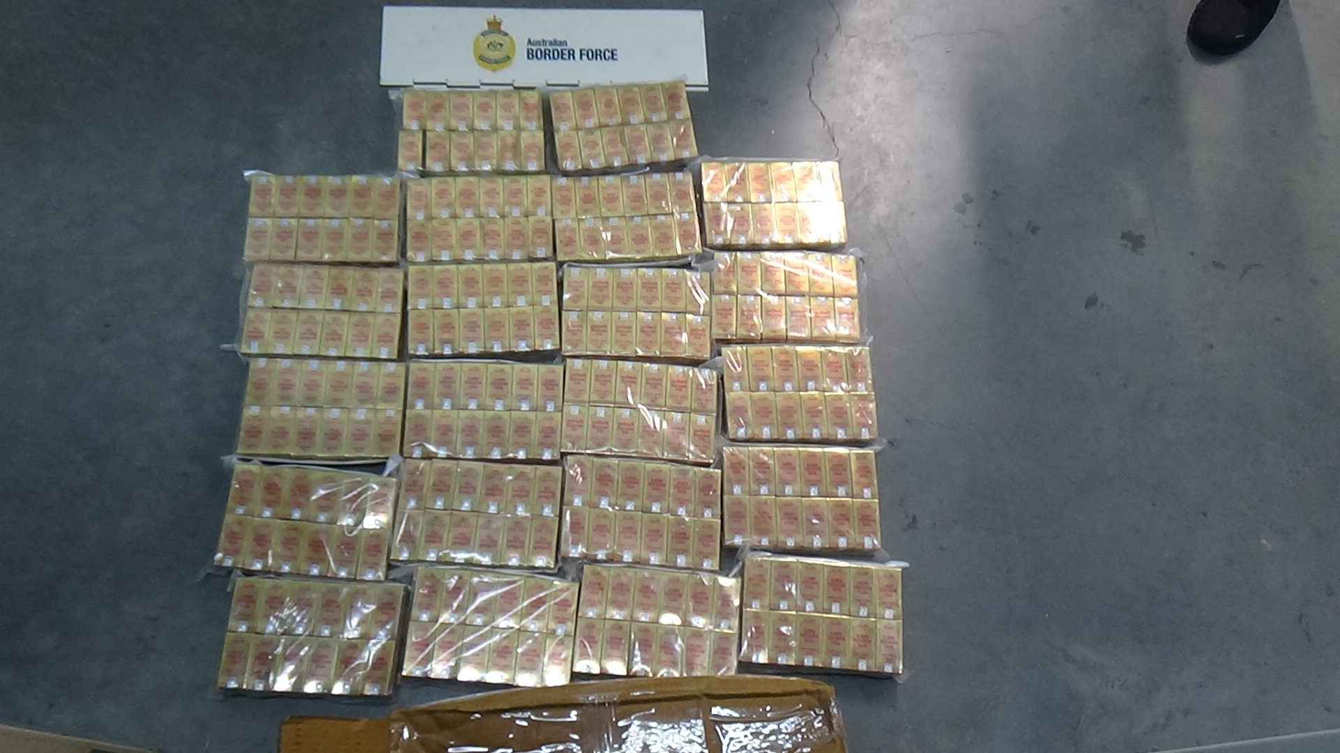 Father and son busted selling opium at Indian grocery store