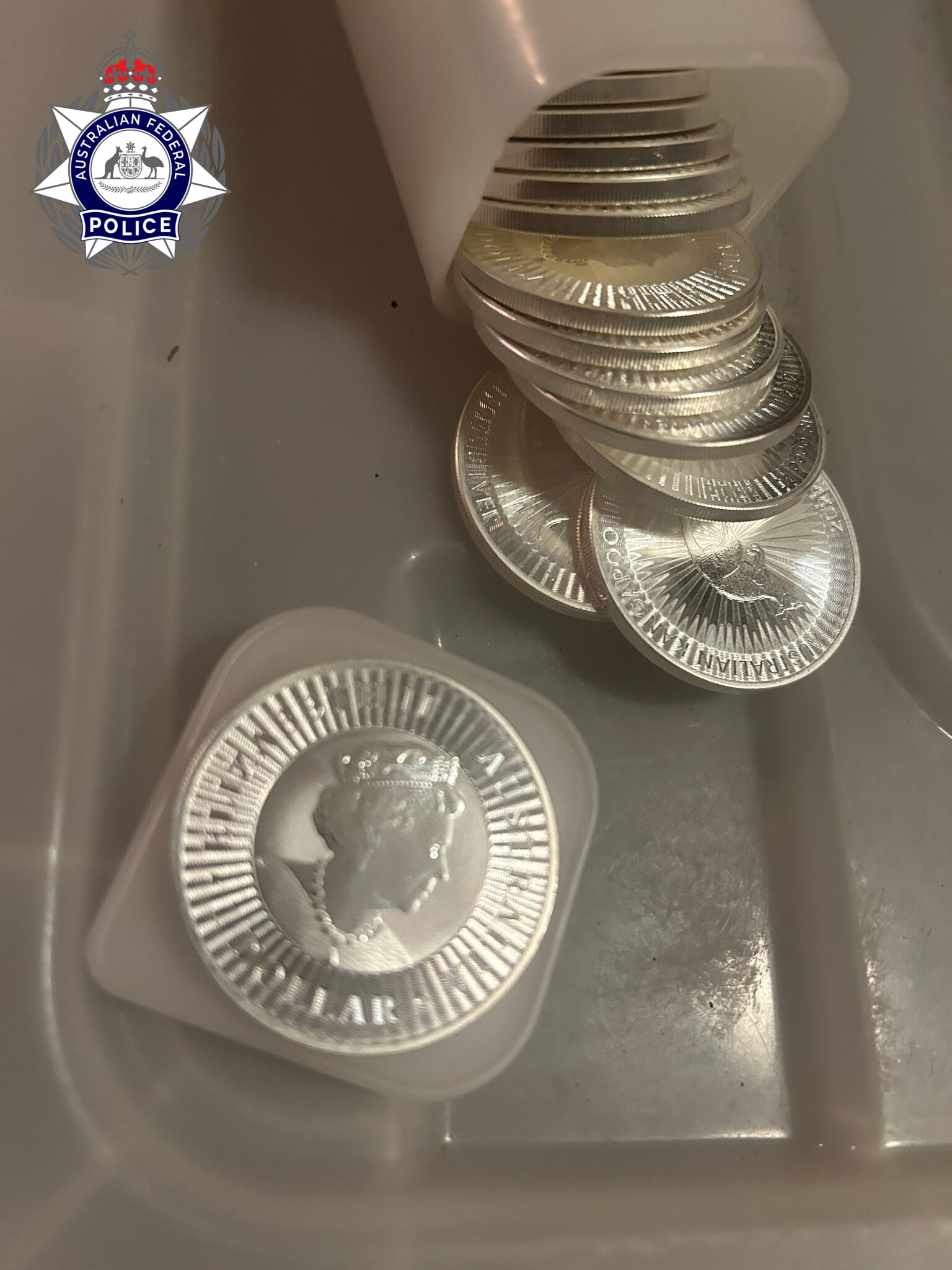 Buckets of gold seized in raids on NDIS fraud syndicate